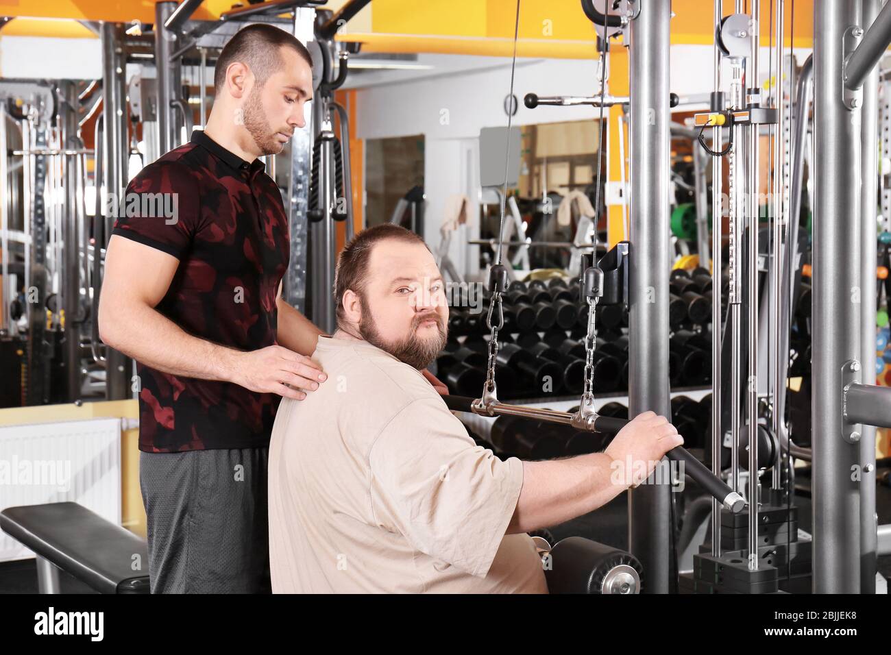 Fat man in gym happy hi-res stock photography and images - Alamy
