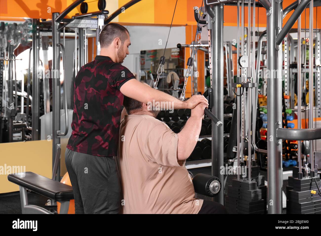 Fat man in gym happy hi-res stock photography and images - Alamy