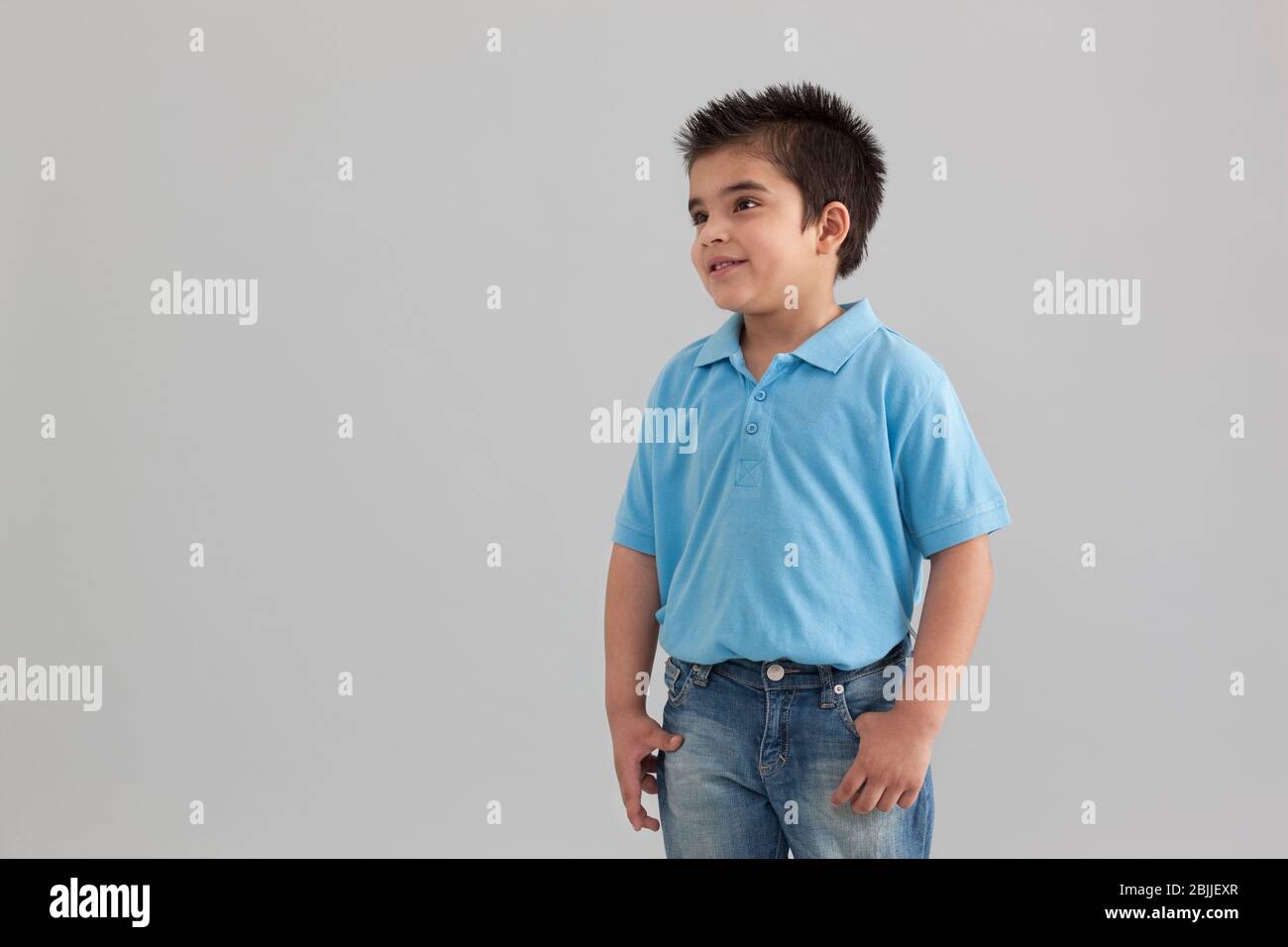 Young boy looking Stock Photo - Alamy