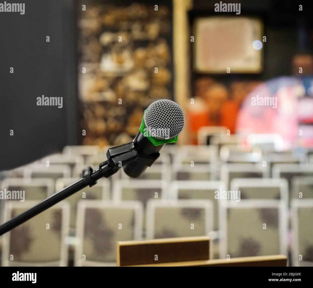 Dynamic microphone on blurred background, closeup Stock Photo - Alamy