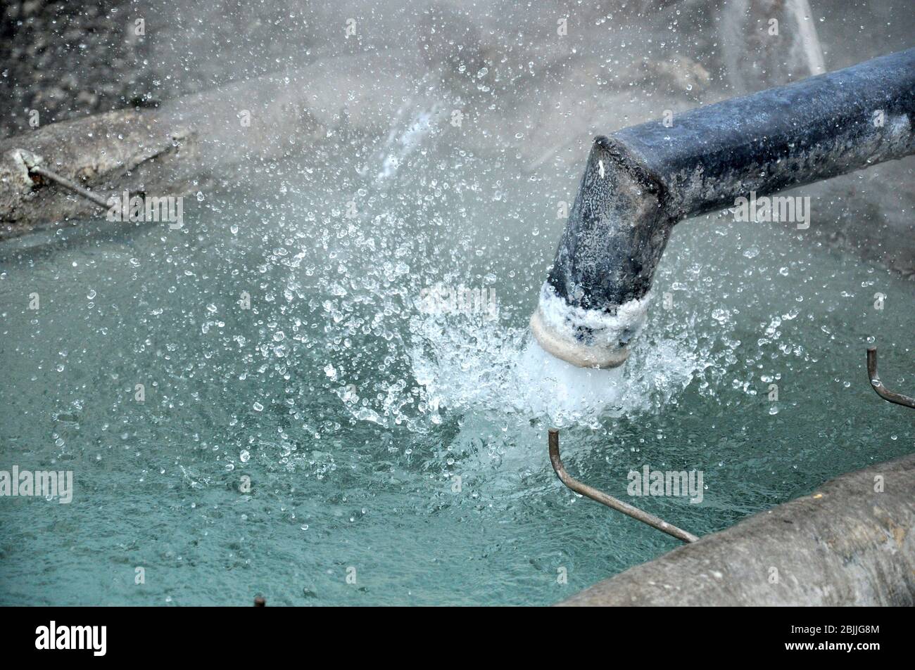 Hot water from geothermal spring to be transported by pipe to fill the ...