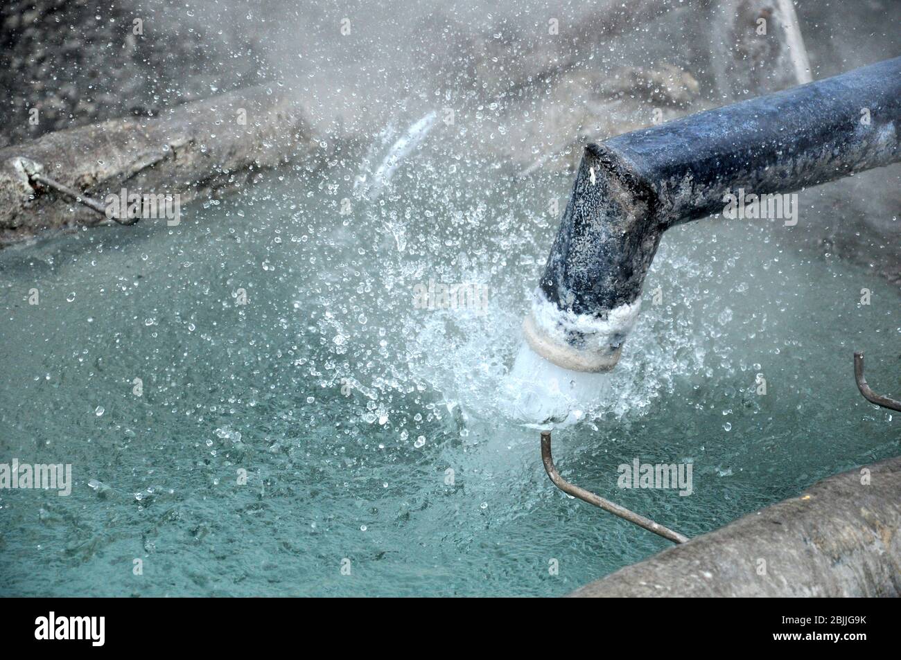 Hot water from geothermal spring to be transported by pipe to fill the ...