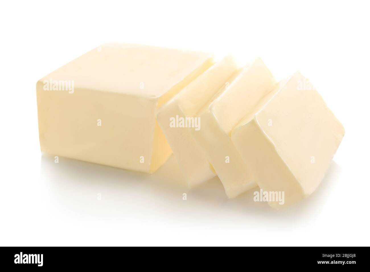 Cut block of butter isolated on white Stock Photo - Alamy