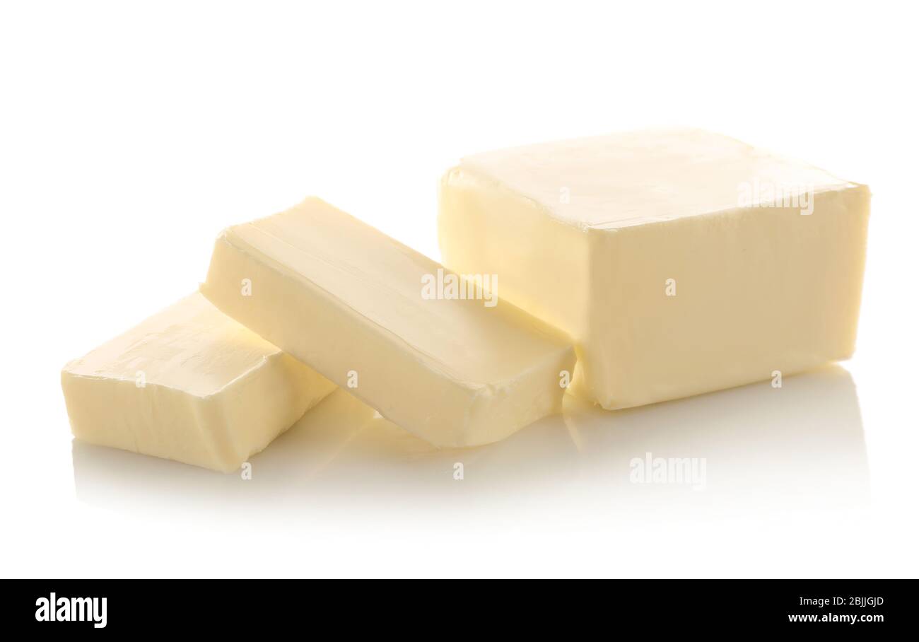 Cut block of butter isolated on white Stock Photo - Alamy