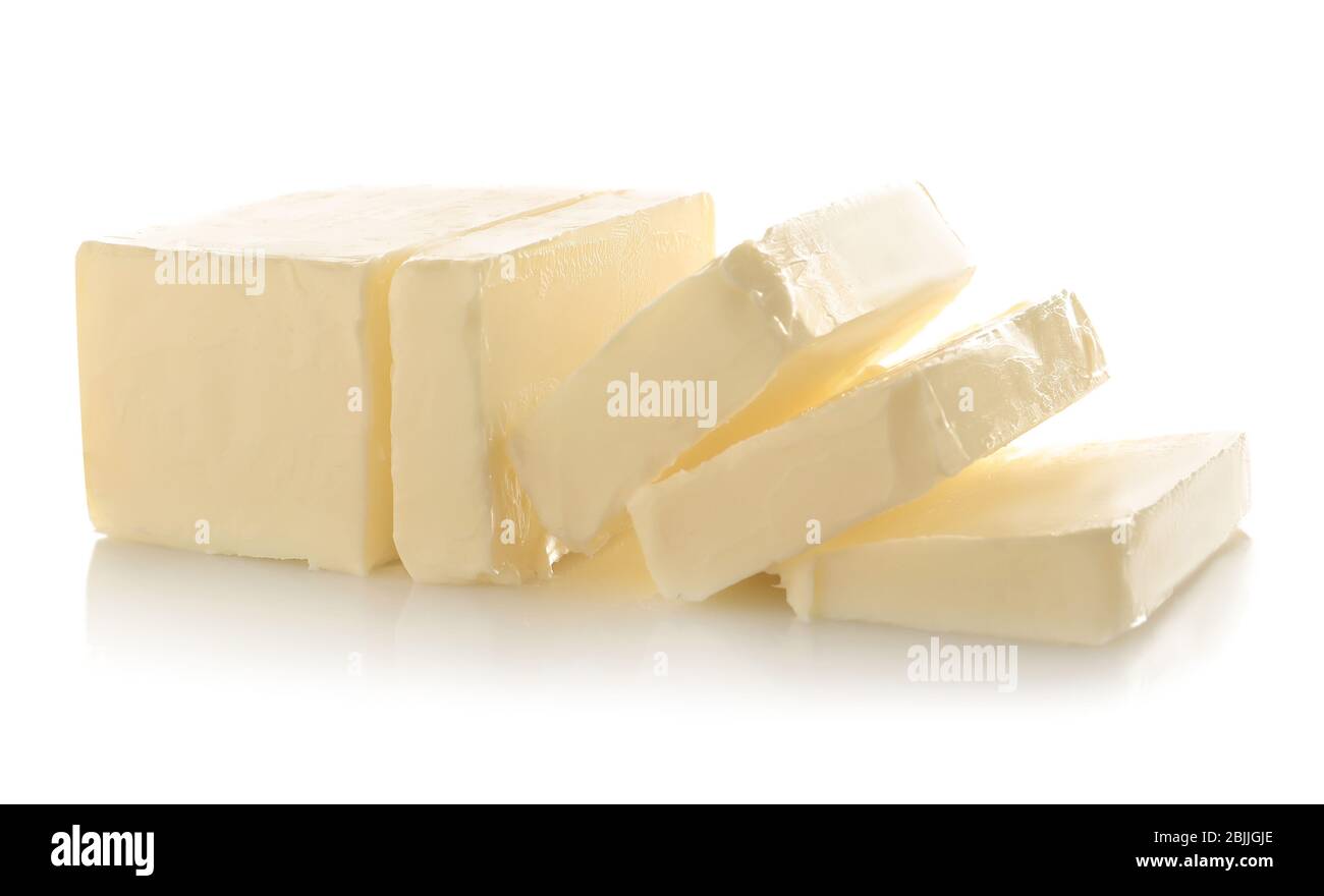 Cut block of butter isolated on white Stock Photo - Alamy