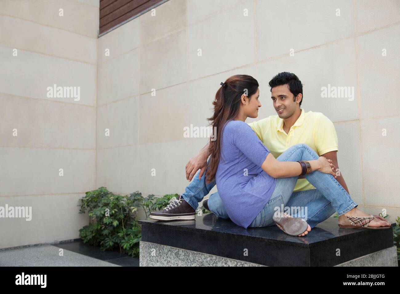 Couple indian outdoor sitting hi-res stock photography and images - Alamy