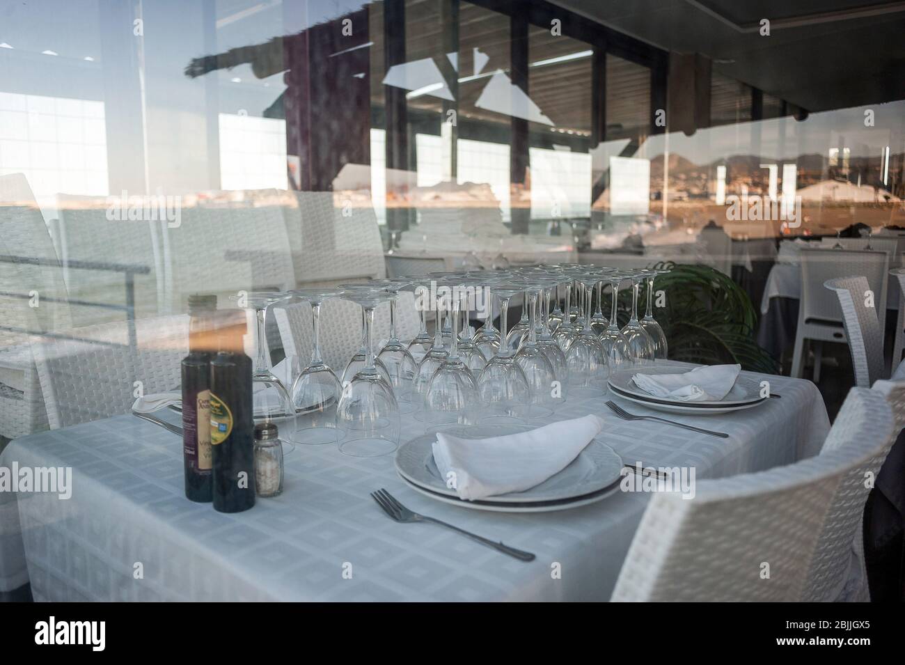 Malaga, Spain. 29th Apr, 2020. Cutleries are seen placed on the tables ...