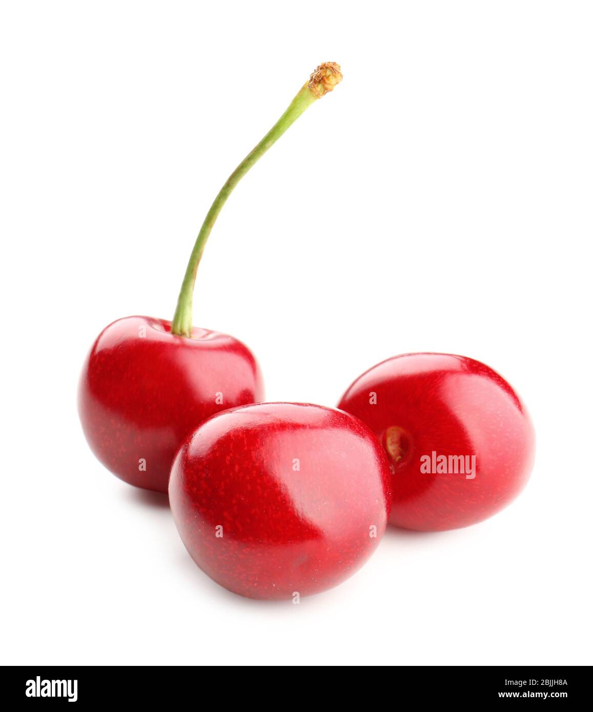 Sweet red cherries, isolated on white Stock Photo - Alamy