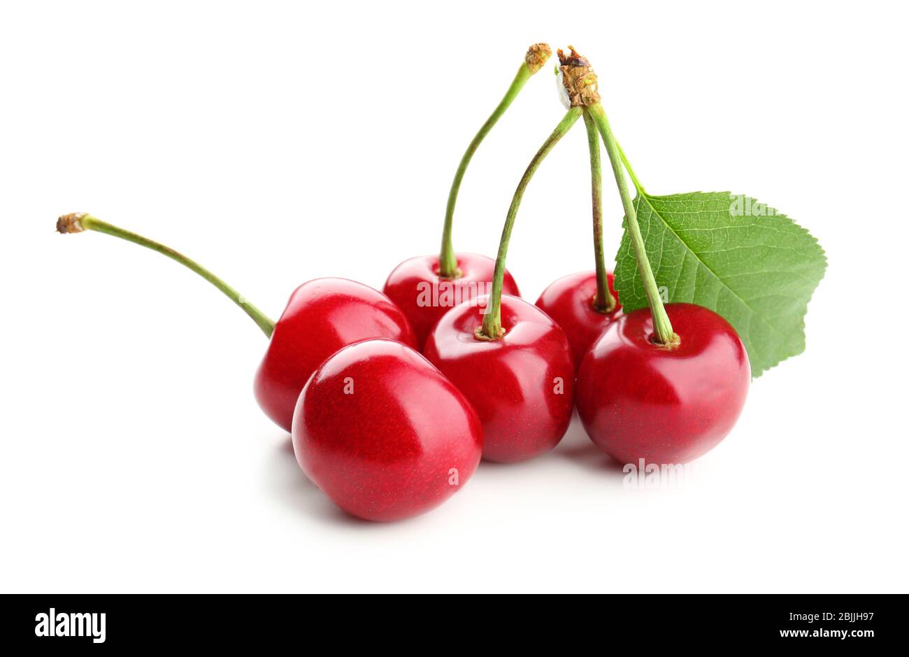 Sweet red cherries, isolated on white Stock Photo - Alamy