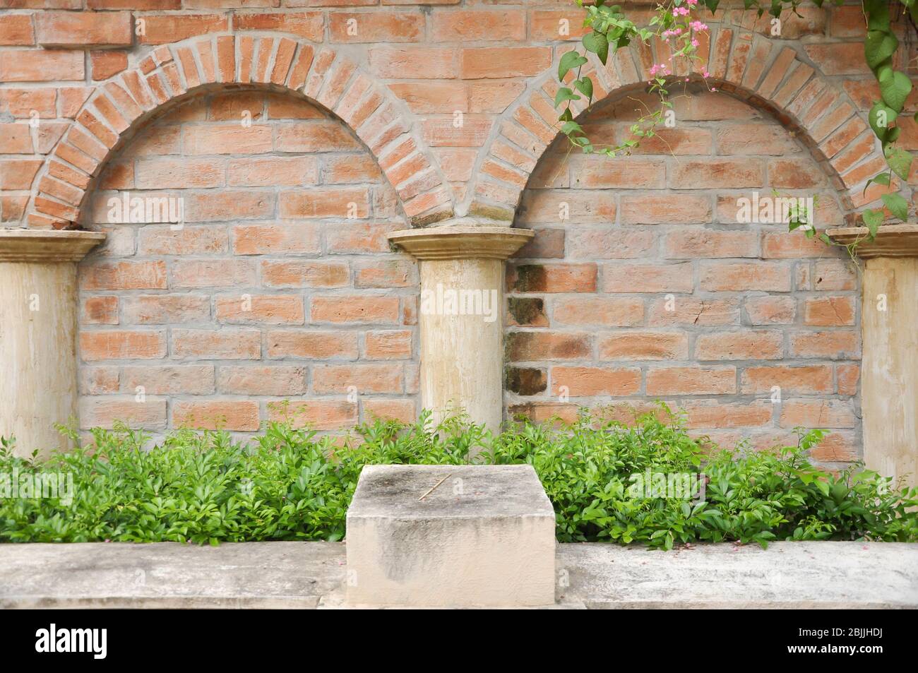 Garden Decoration in different corners of brick clay Stock Photo - Alamy