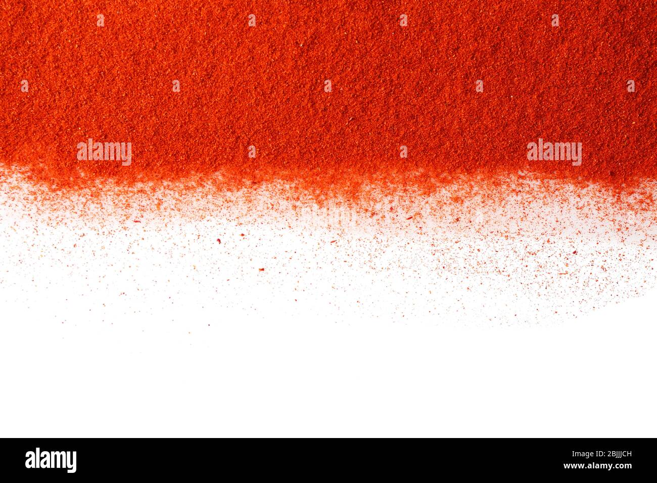Chili powder on white background Stock Photo - Alamy