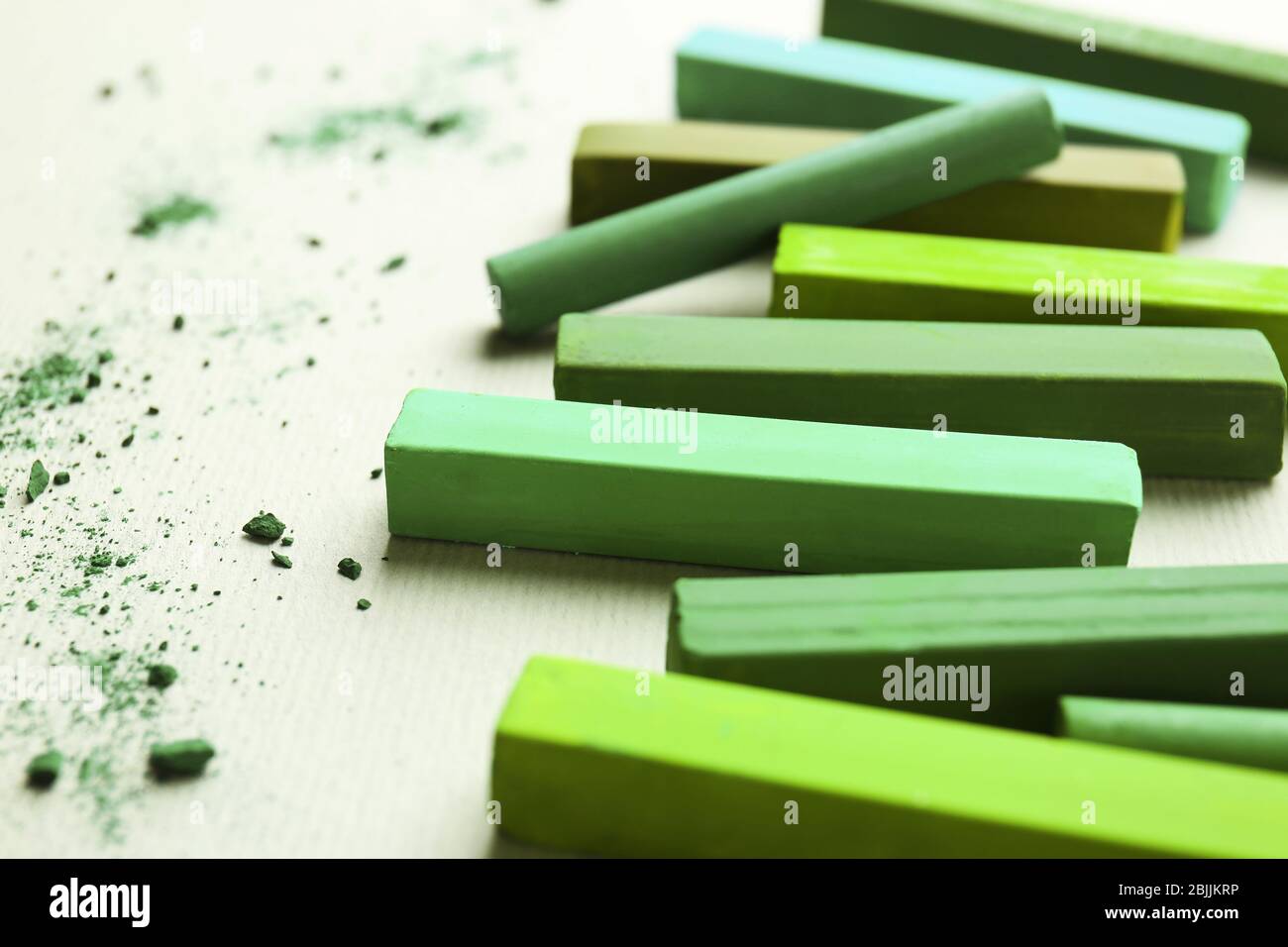 Bright green chalk on white background Stock Photo - Alamy