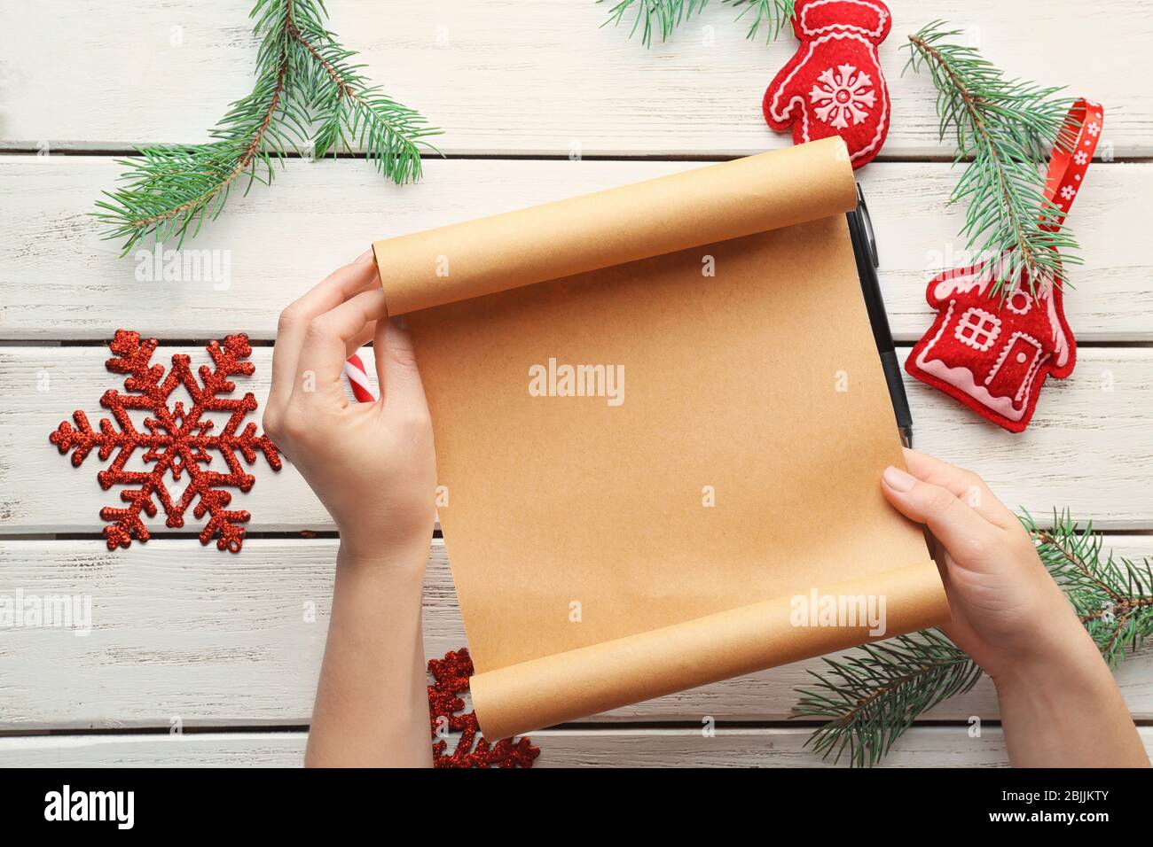 Woman holding scroll hi-res stock photography and images - Alamy
