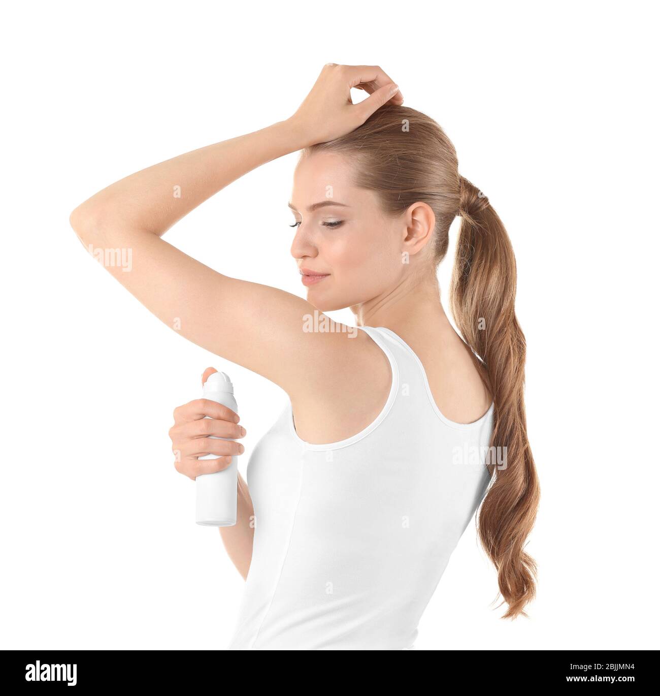 Beautiful young woman with deodorant on white background Stock Photo ...