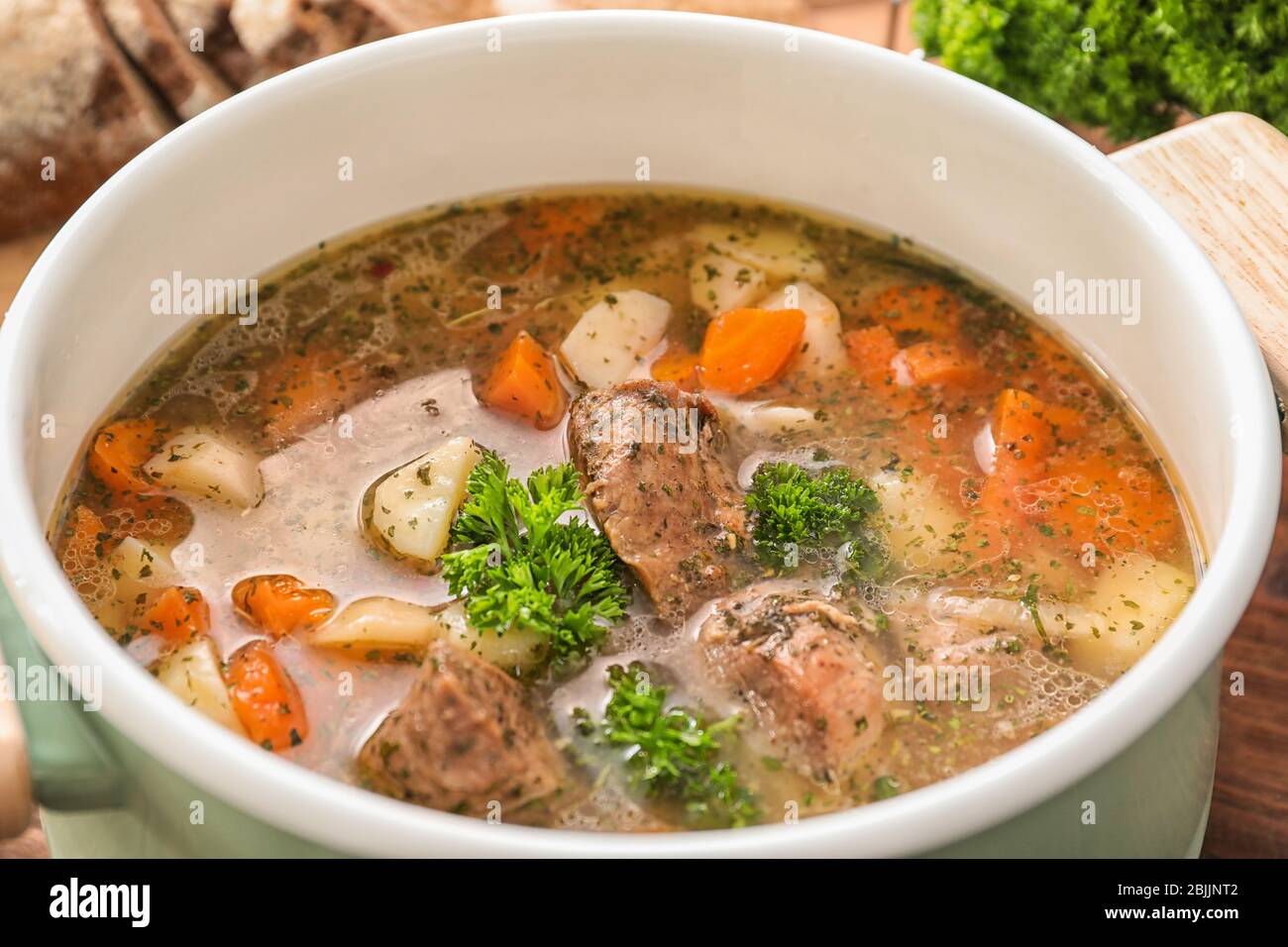 Ceramic pot with stewed meat, closeup Stock Photo - Alamy