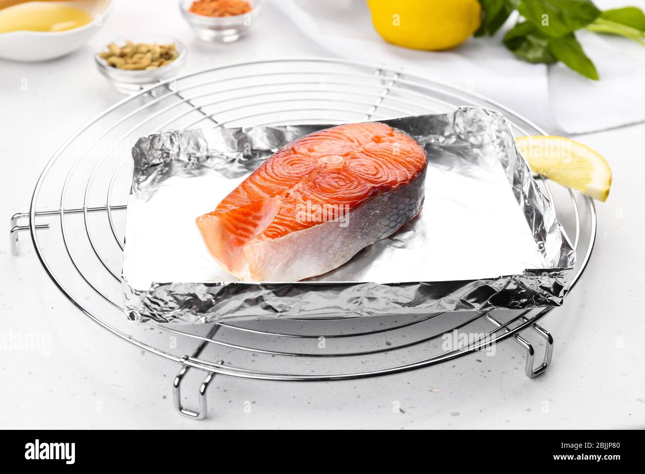 Fish fillet on metal stand Stock Photo - Alamy
