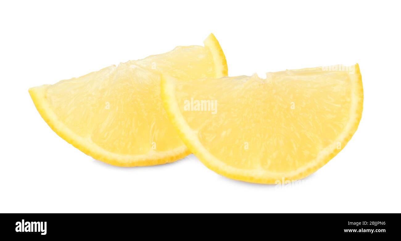 Slices of fresh lemon on white background Stock Photo - Alamy
