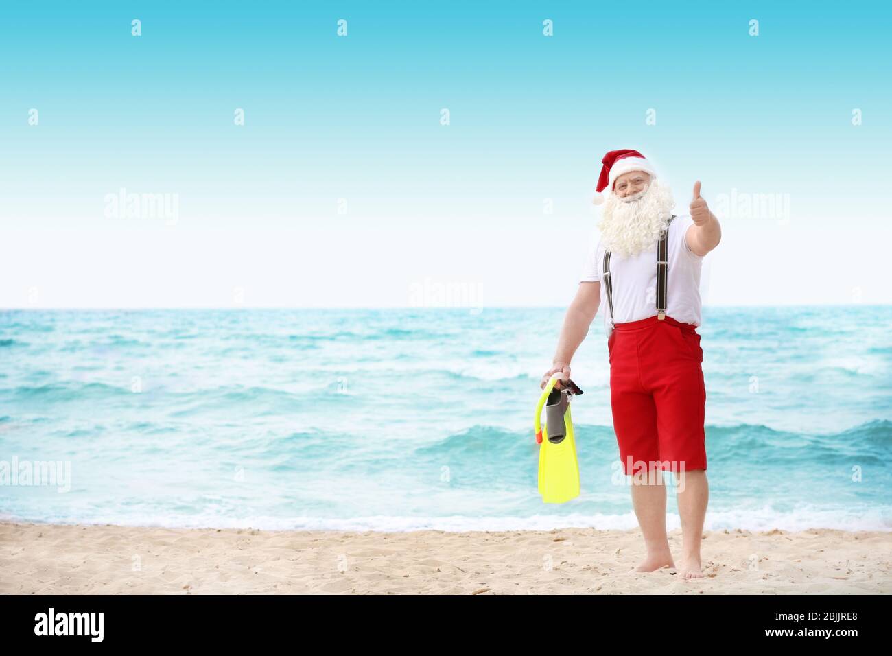Authentic Santa Claus on beach Stock Photo - Alamy