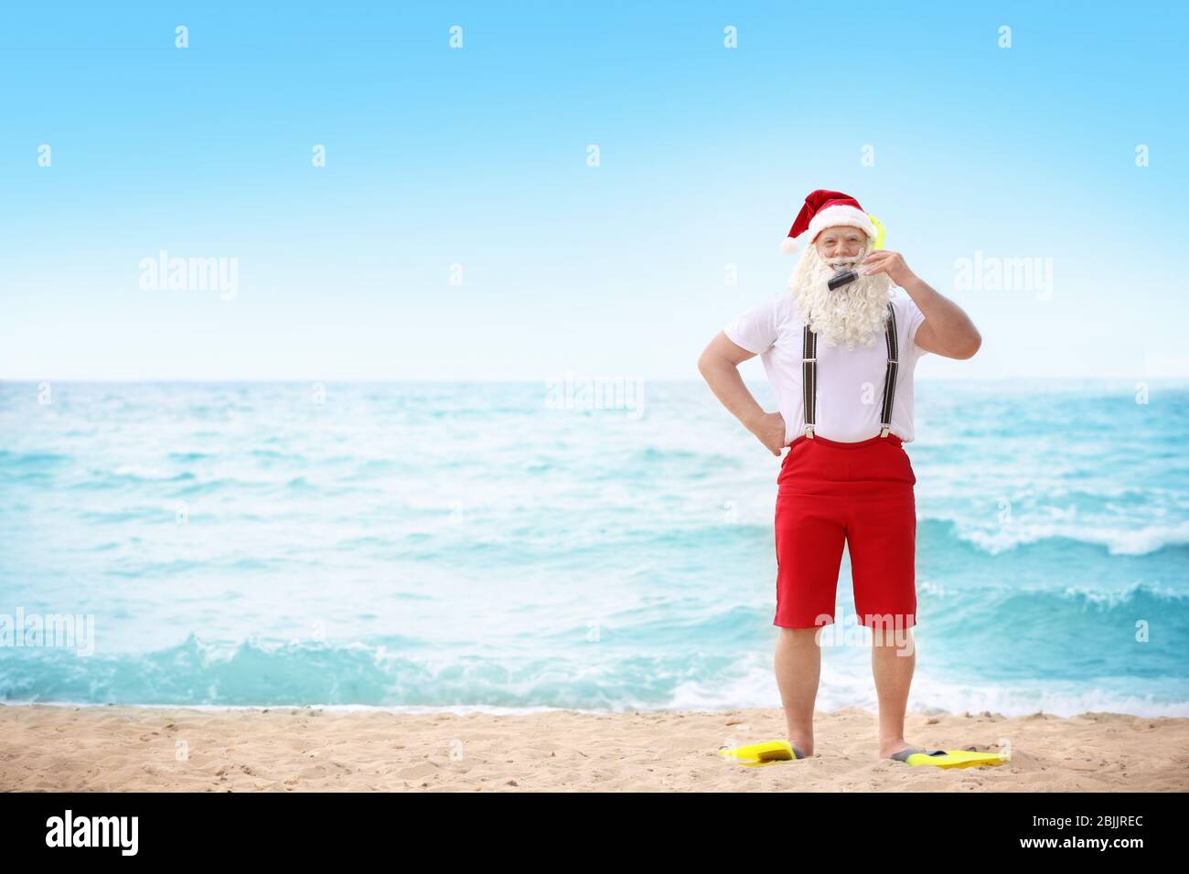 Authentic Santa Claus on beach Stock Photo - Alamy