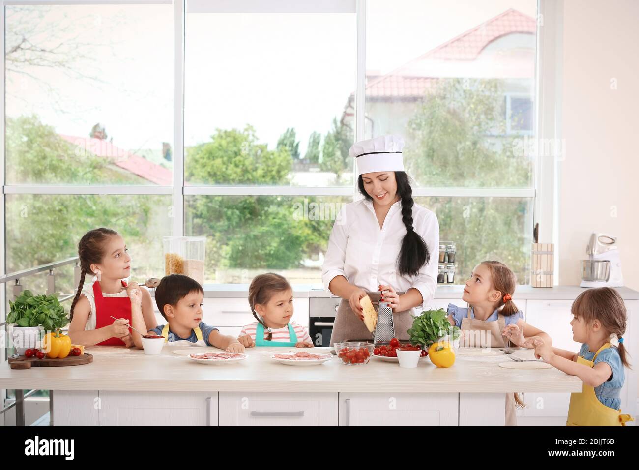 Cooking school children pizza dough hi-res stock photography and images ...