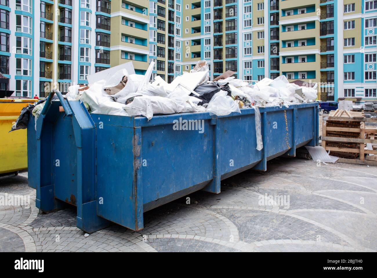 Blue garbage containers outdoors Stock Photo - Alamy