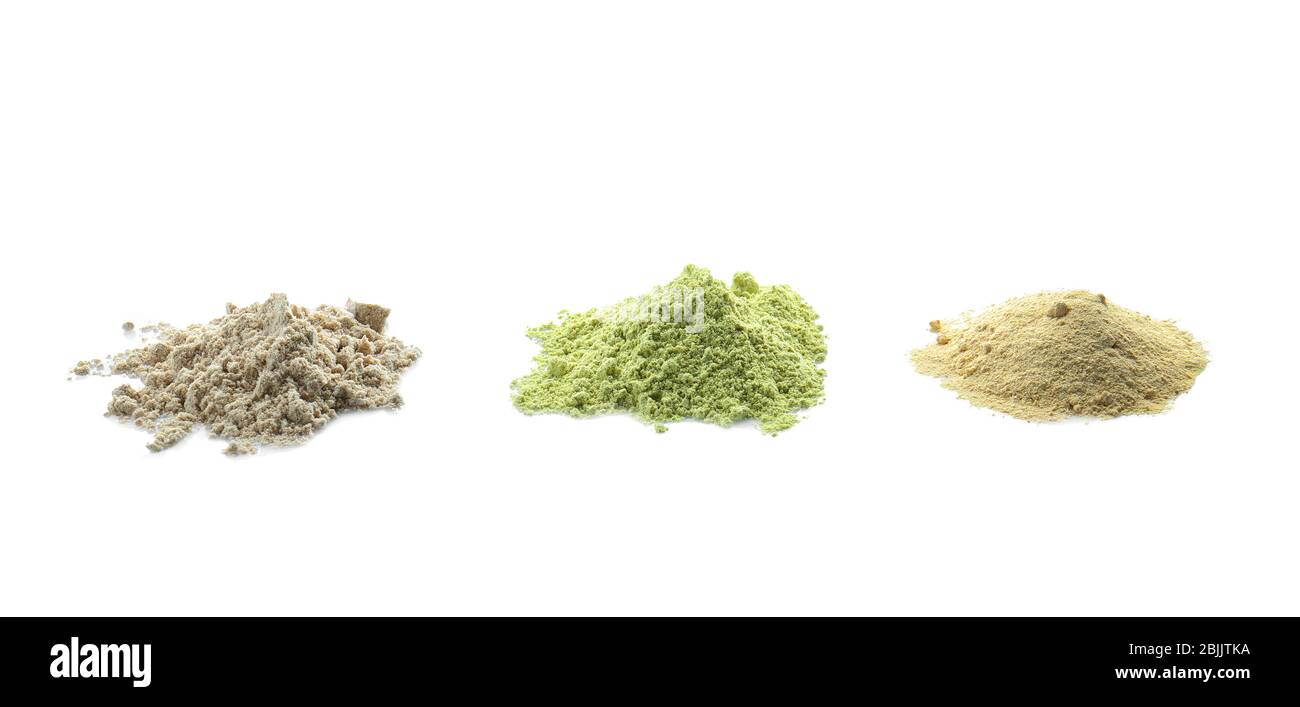 Various colorful superfood powders on white background Stock Photo - Alamy