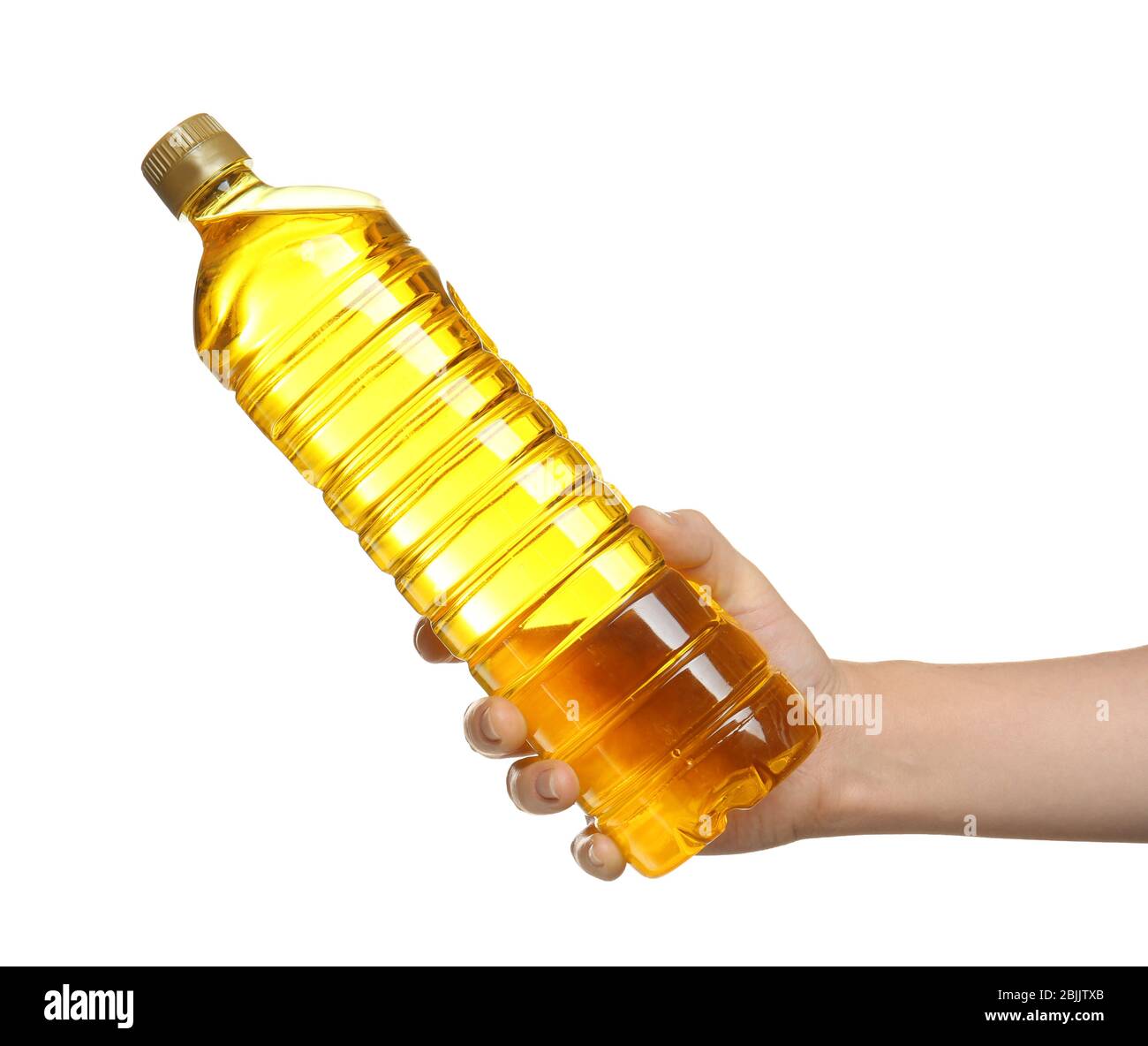 Female hand holding bottle of cooking oil on white background Stock ...