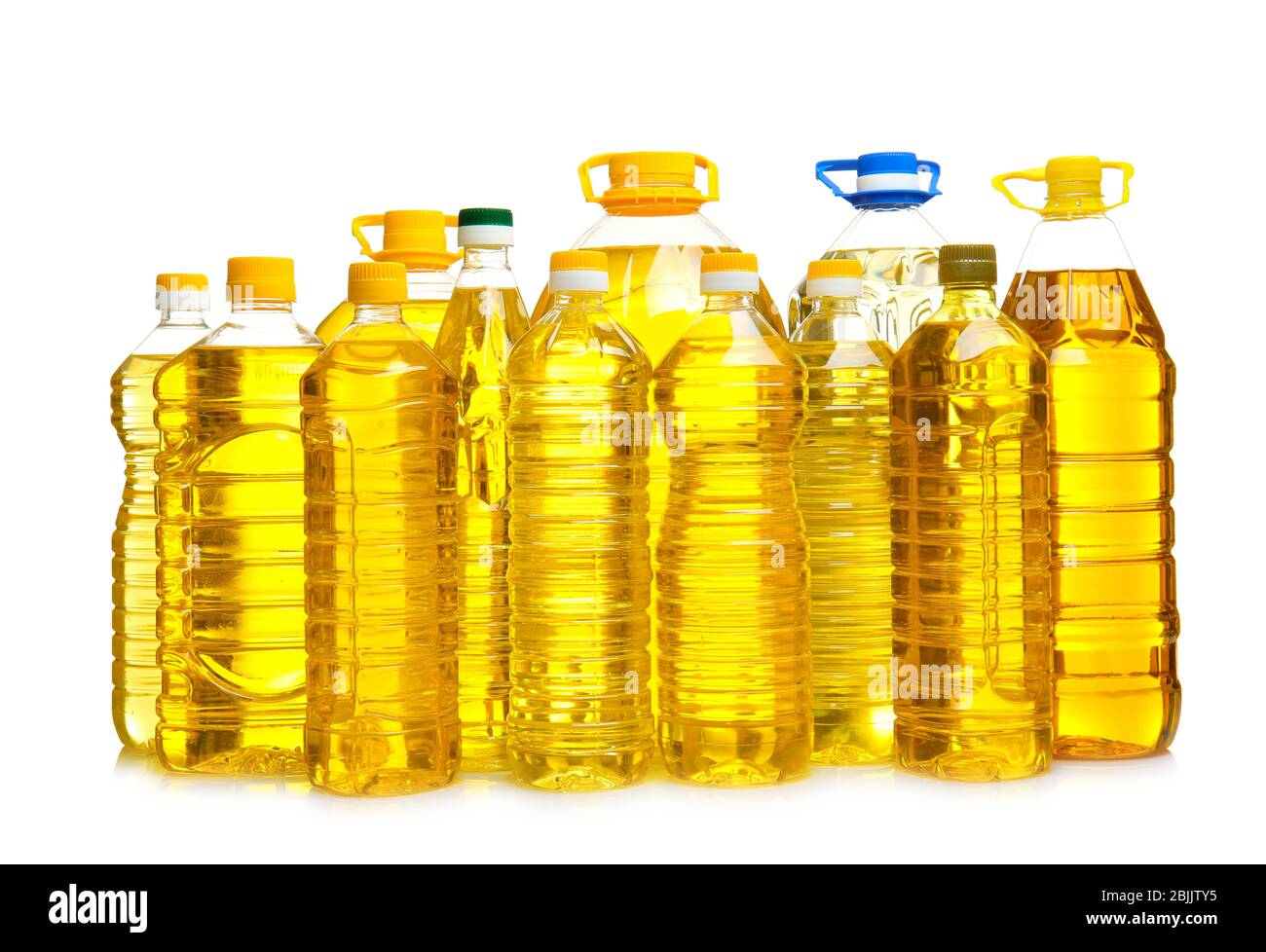 Bottles of cooking oil, isolated on white Stock Photo - Alamy