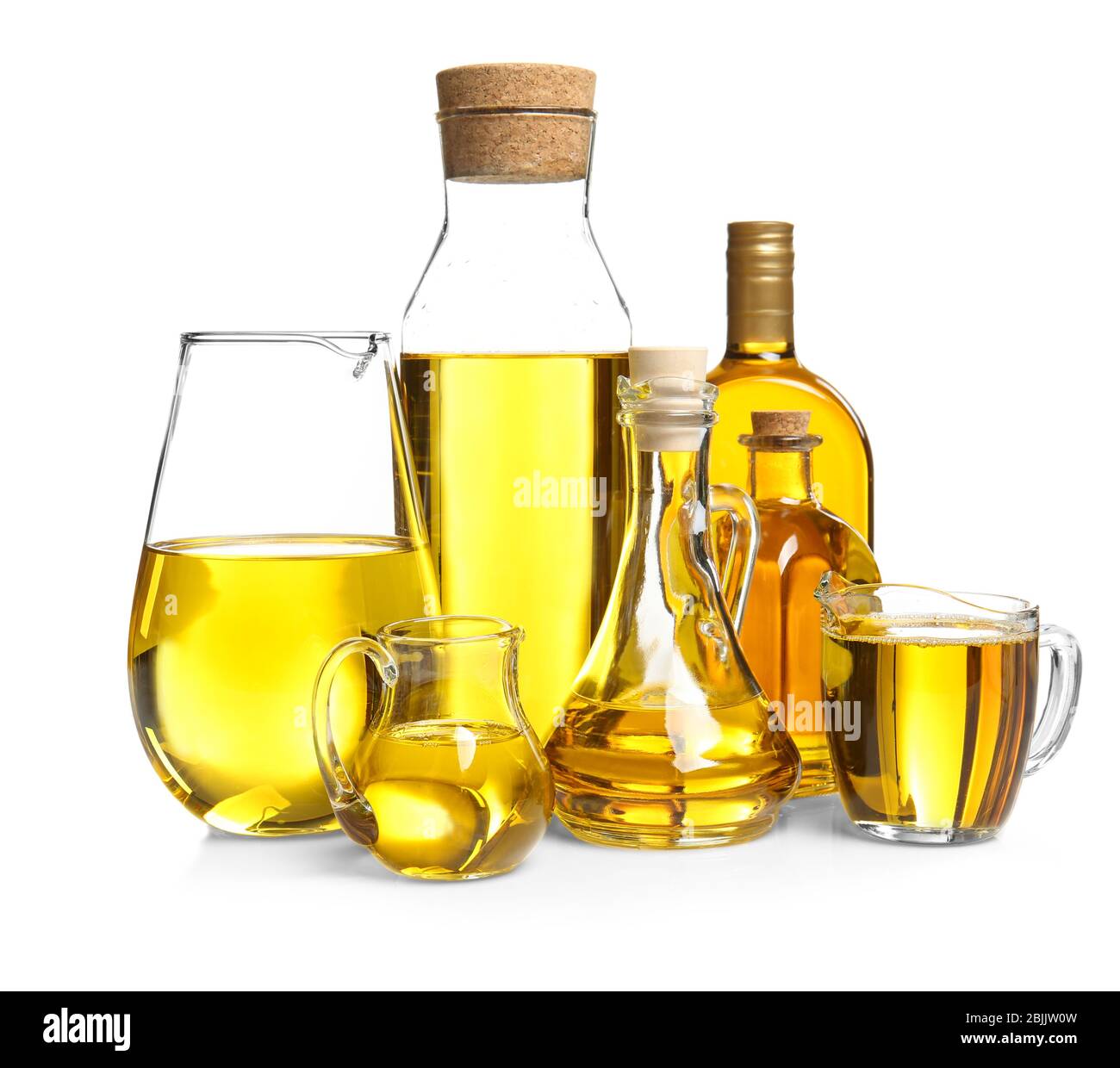 Composition with cooking oil on white background Stock Photo - Alamy