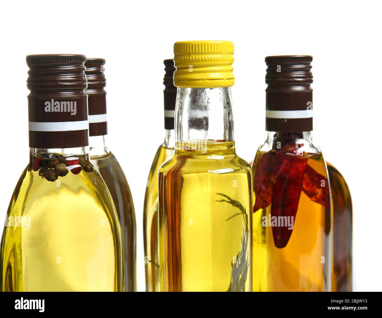 Bottles of cooking oil, isolated on white Stock Photo - Alamy