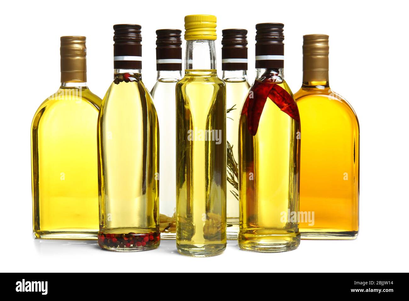 Bottles of cooking oil, isolated on white Stock Photo - Alamy