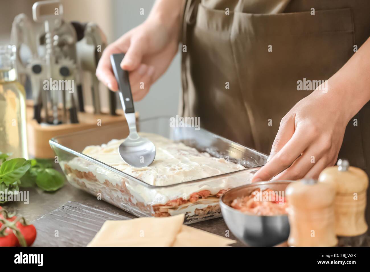 Woman lasagne hi-res stock photography and images - Alamy