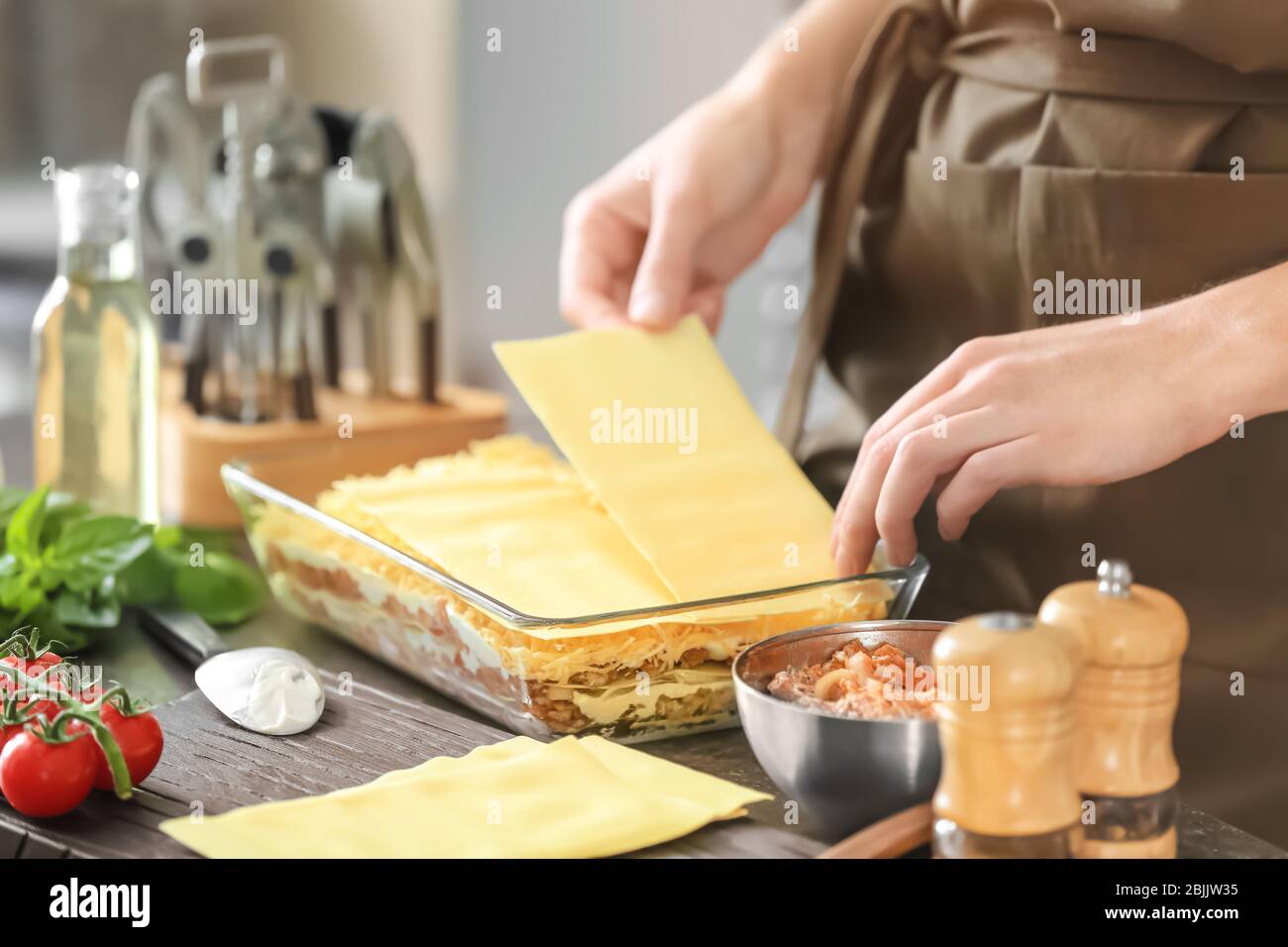 Preparing lasagne hi-res stock photography and images - Alamy