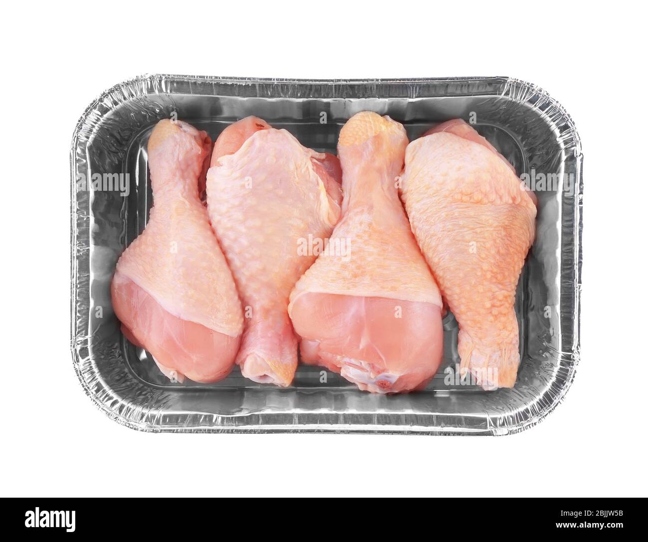 Container with chicken drumsticks, isolated on white Stock Photo - Alamy