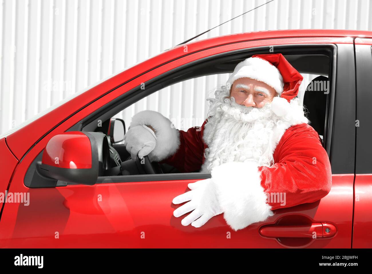 Santa claus looking out window hi-res stock photography and images - Alamy