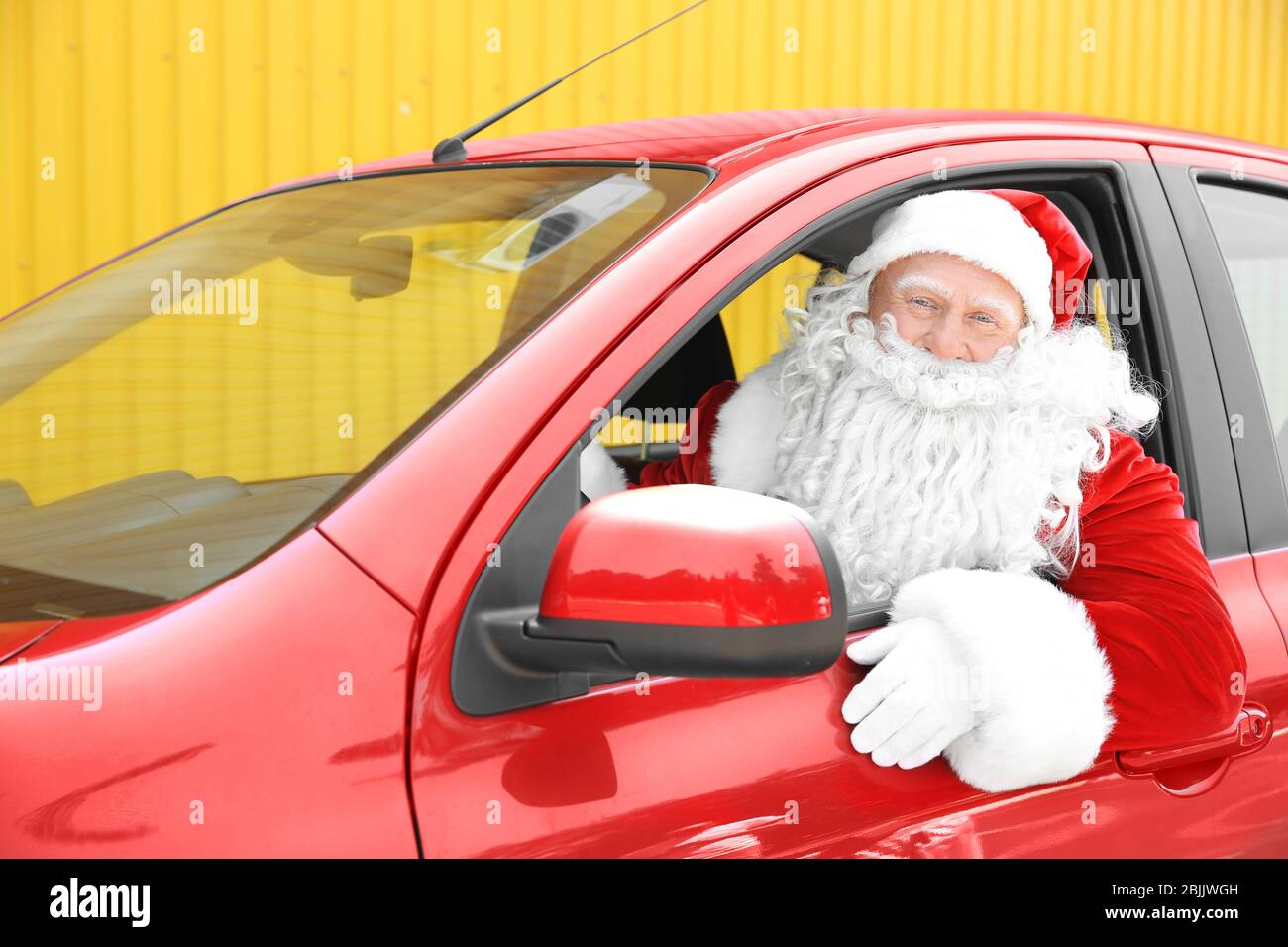 Santa claus looking out window hi-res stock photography and images - Alamy