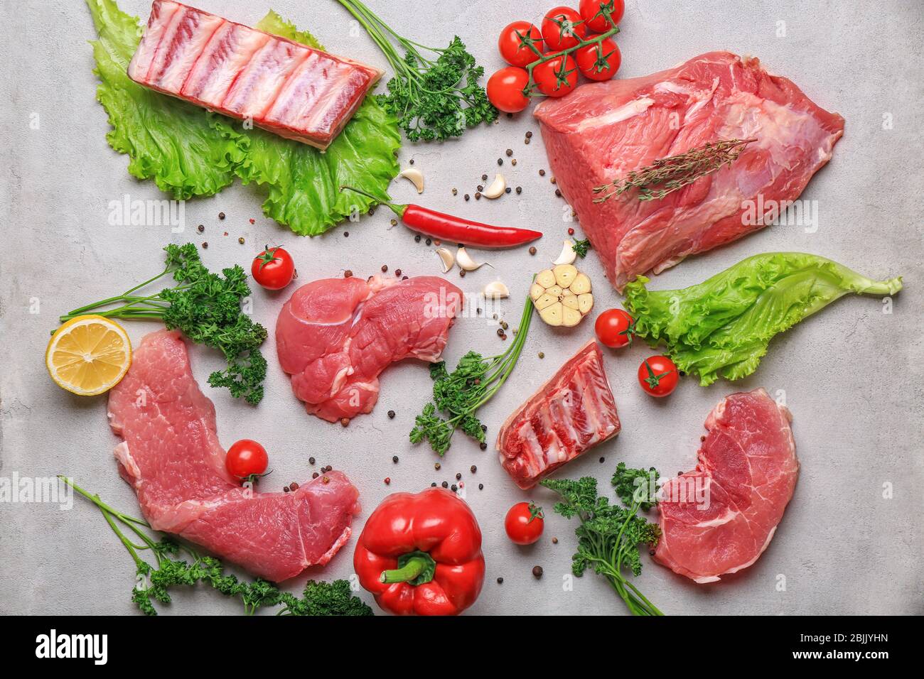 Different types of meat on table Stock Photo - Alamy
