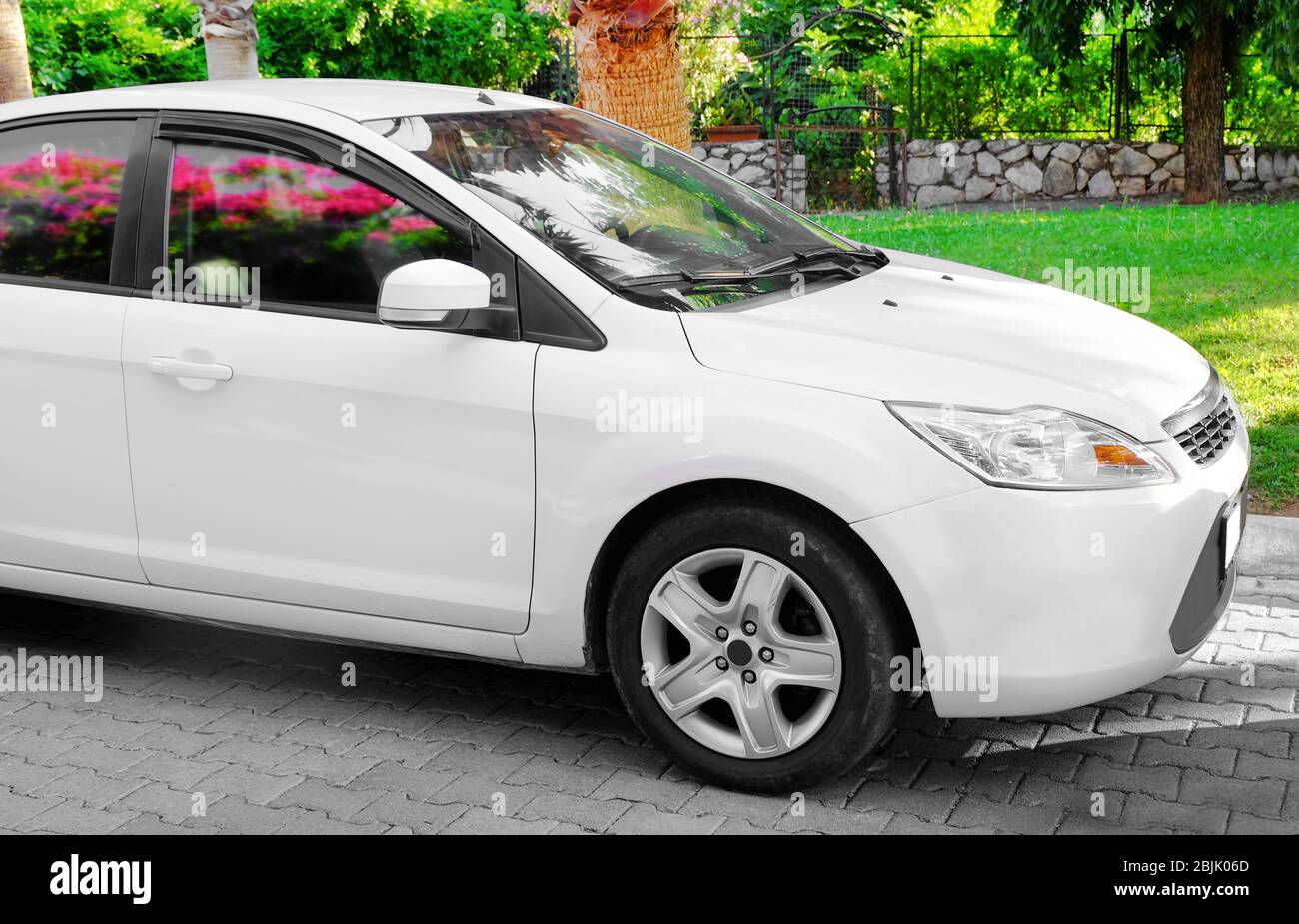 White modern car outdoors Stock Photo - Alamy