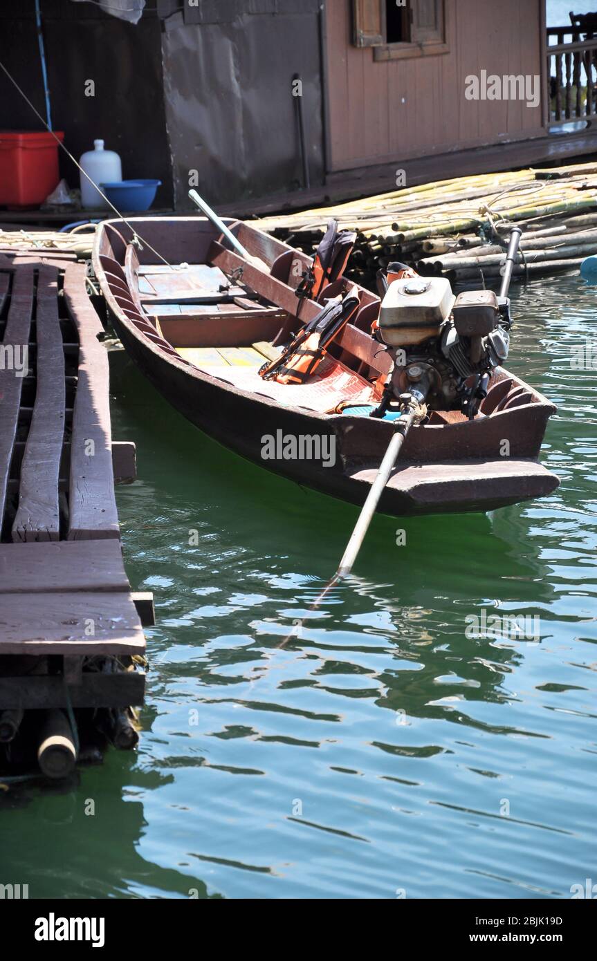 boat with engine at the raft house Stock Photo - Alamy