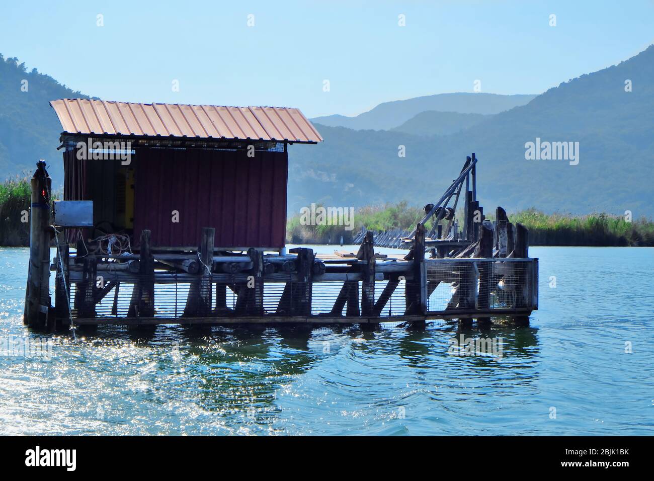 Fencing of fish farm on river Stock Photo - Alamy