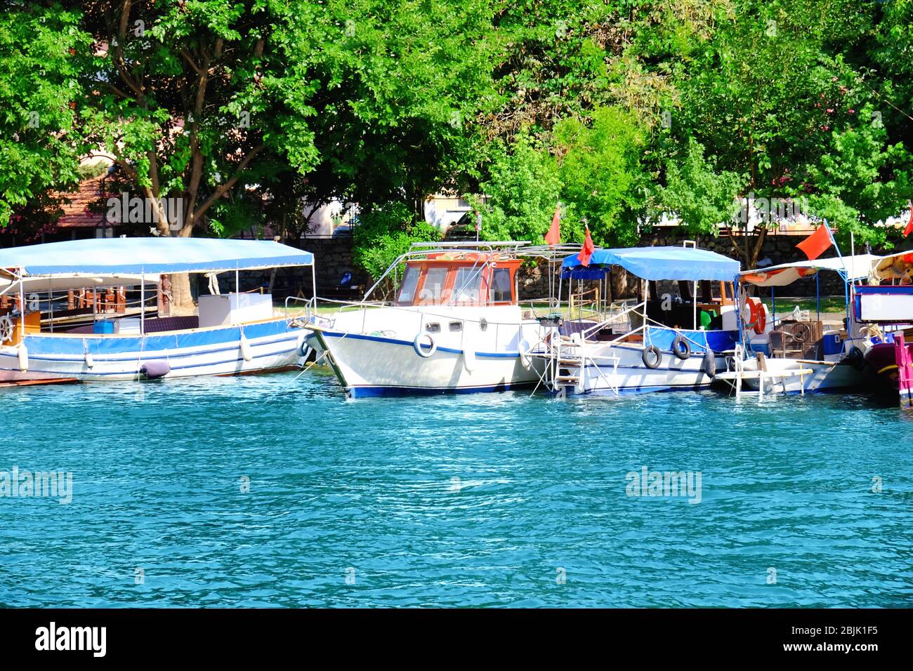 Beautiful view of berthed boats on sunny summer day Stock Photo - Alamy