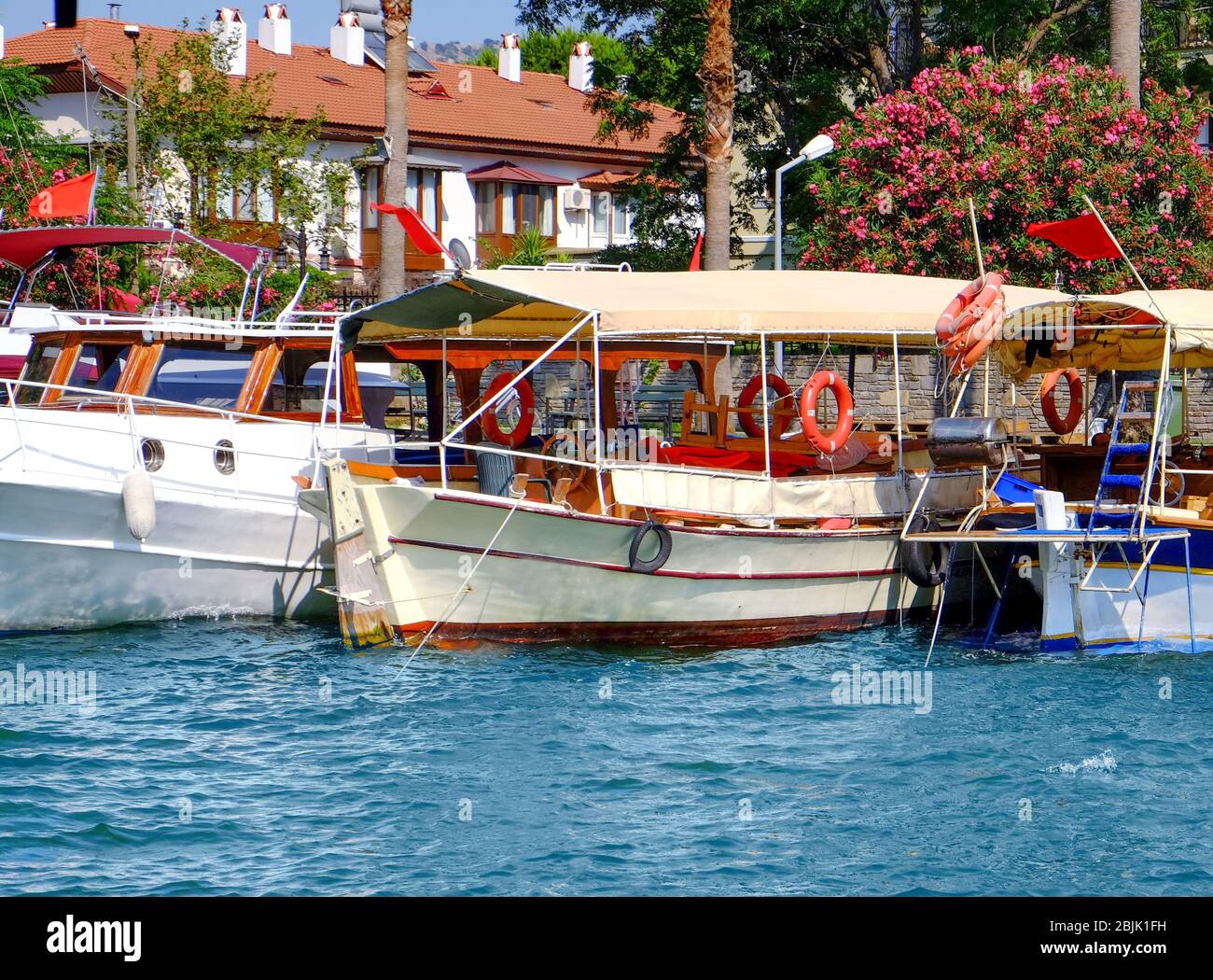 Beautiful view of berthed boats on sunny summer day Stock Photo - Alamy