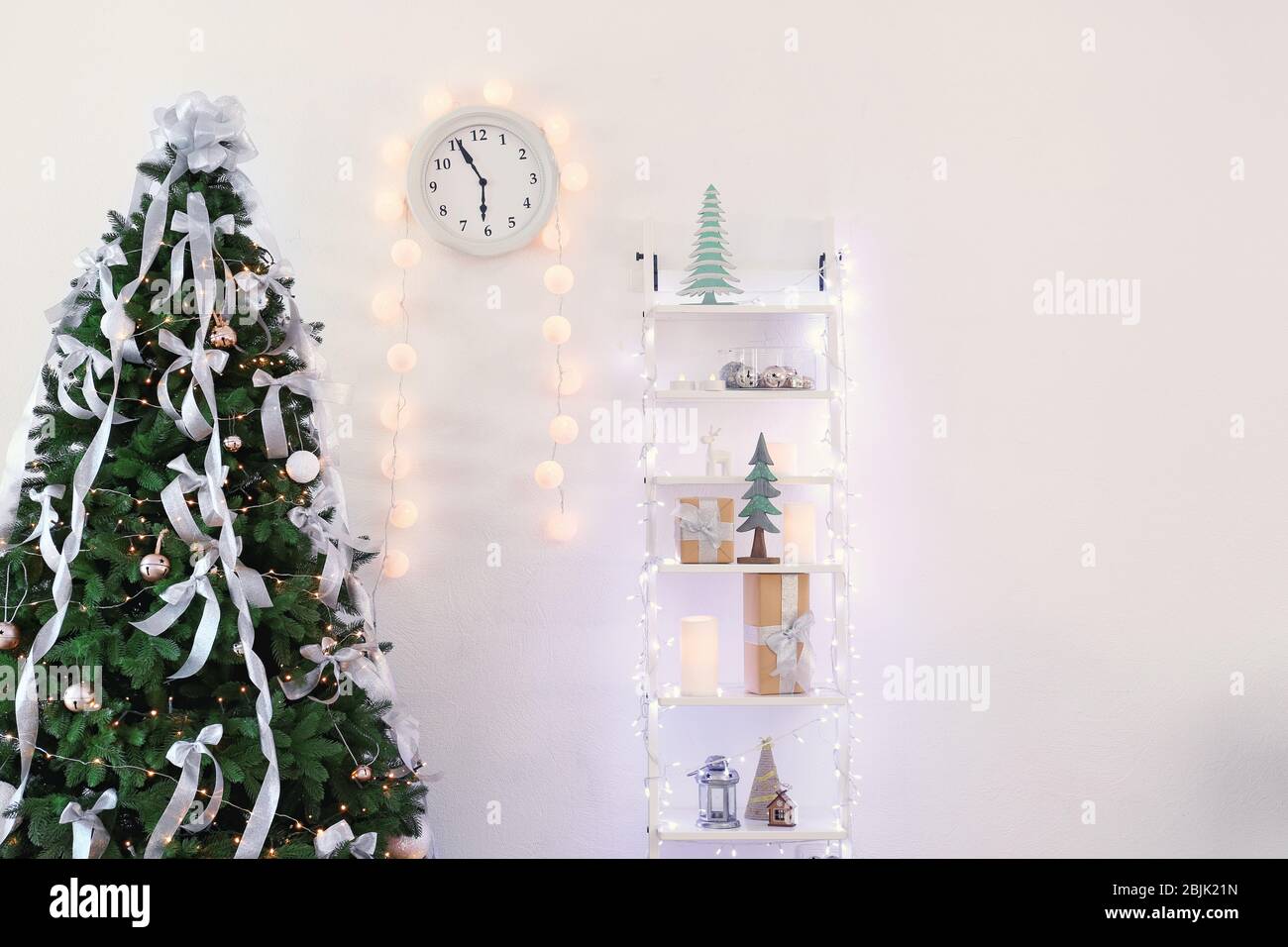 Decorated room with beautiful Christmas tree Stock Photo - Alamy