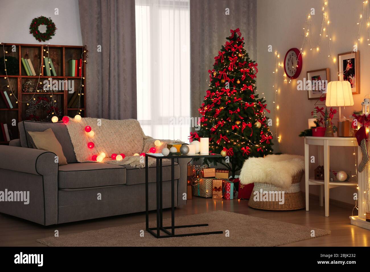 Room decorated for Christmas with beautiful fir tree Stock Photo - Alamy