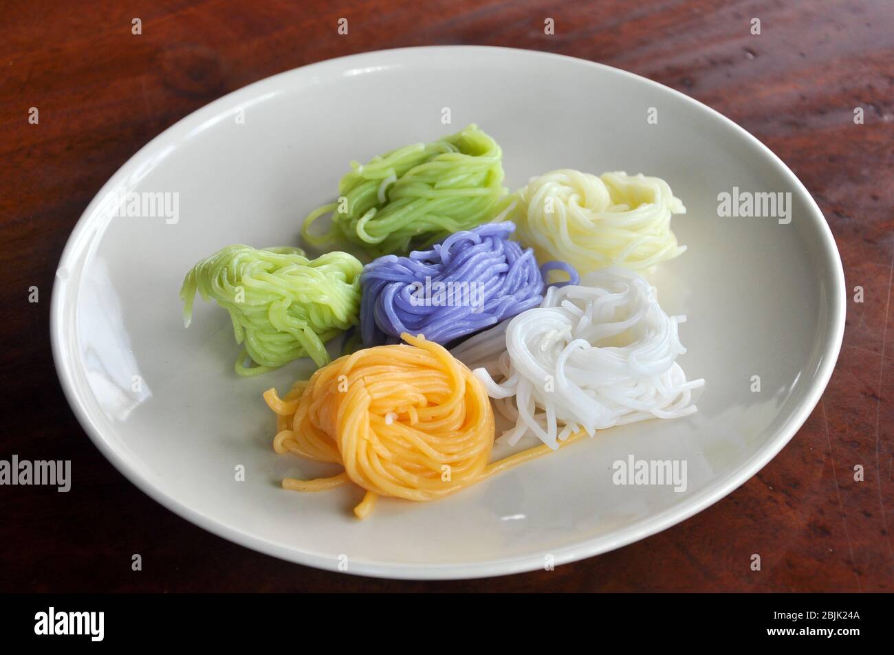 Khanom chin are fresh rice noodles in Thai cuisine which are made from ...