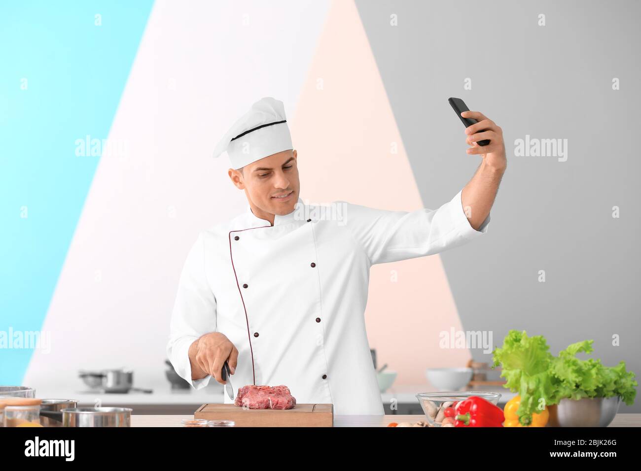 Photo young male cook hi-res stock photography and images - Alamy