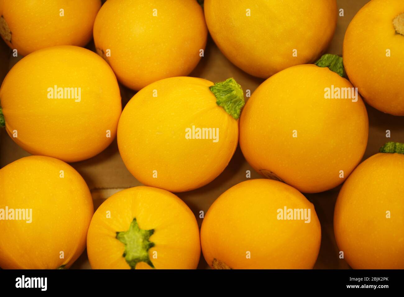 Small yellow pumpkins, closeup Stock Photo - Alamy