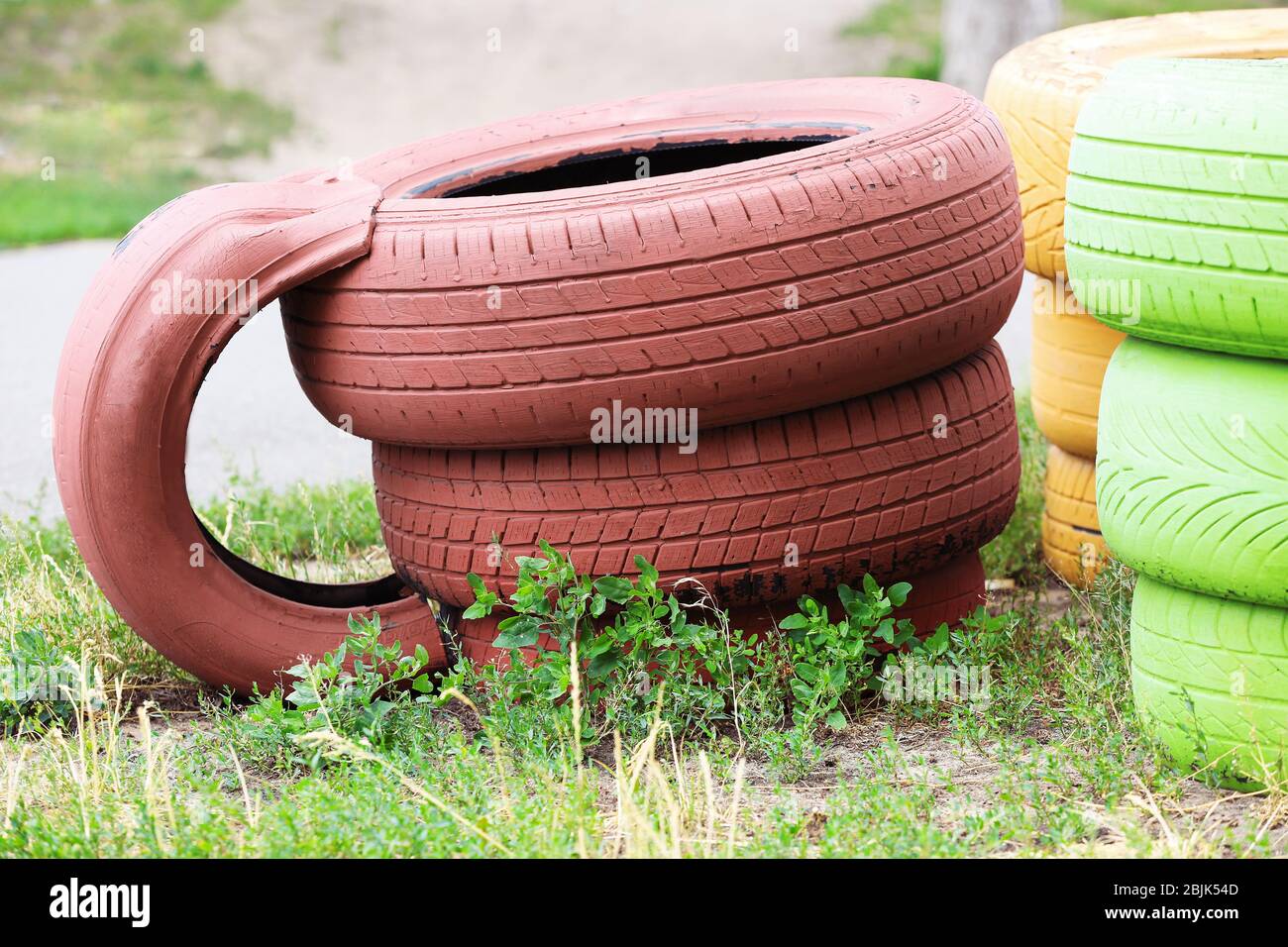 Decorative cups made of automobile tires, outdoors Stock Photo - Alamy