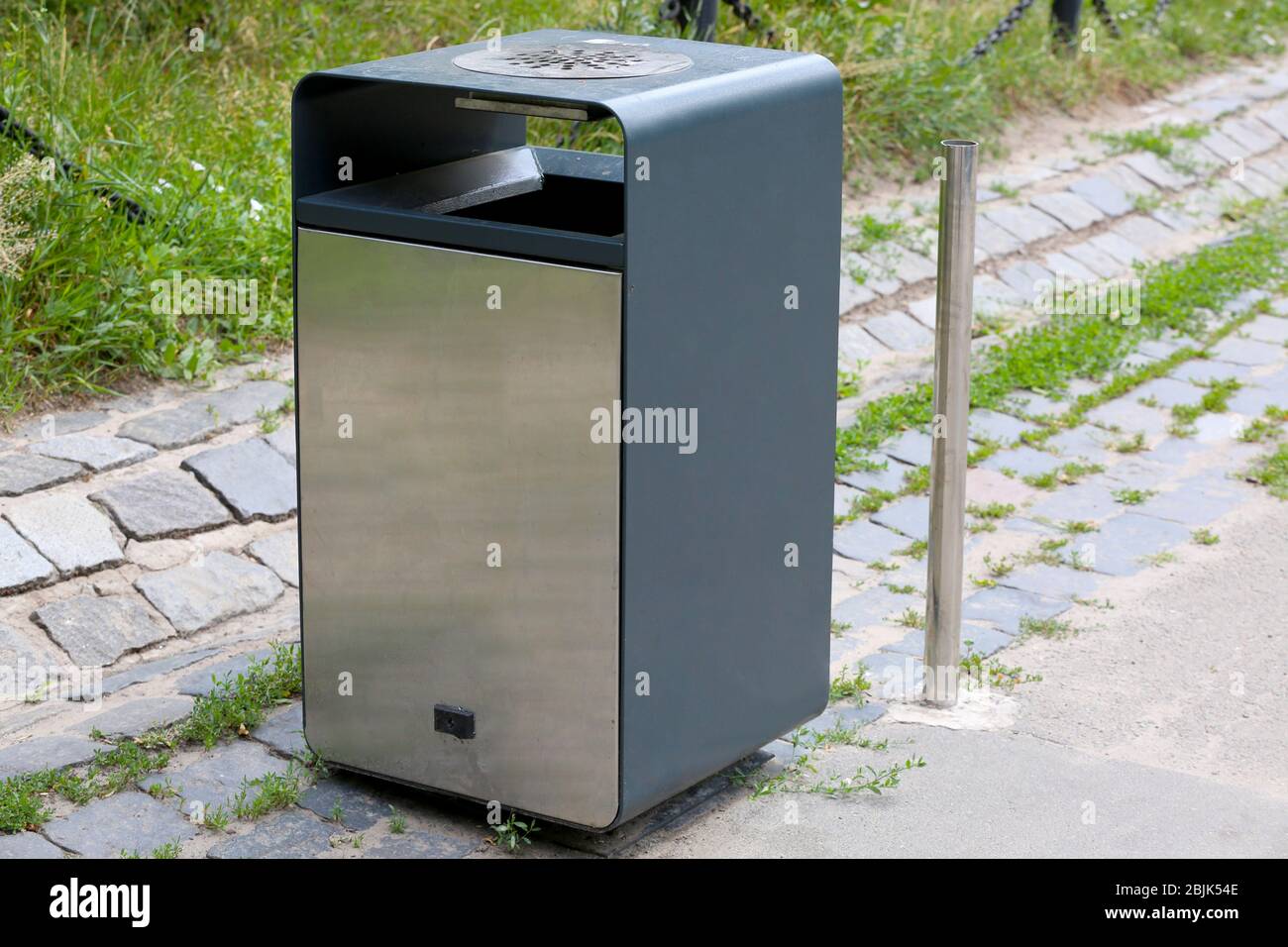 Modern garbage bin outdoors Stock Photo - Alamy