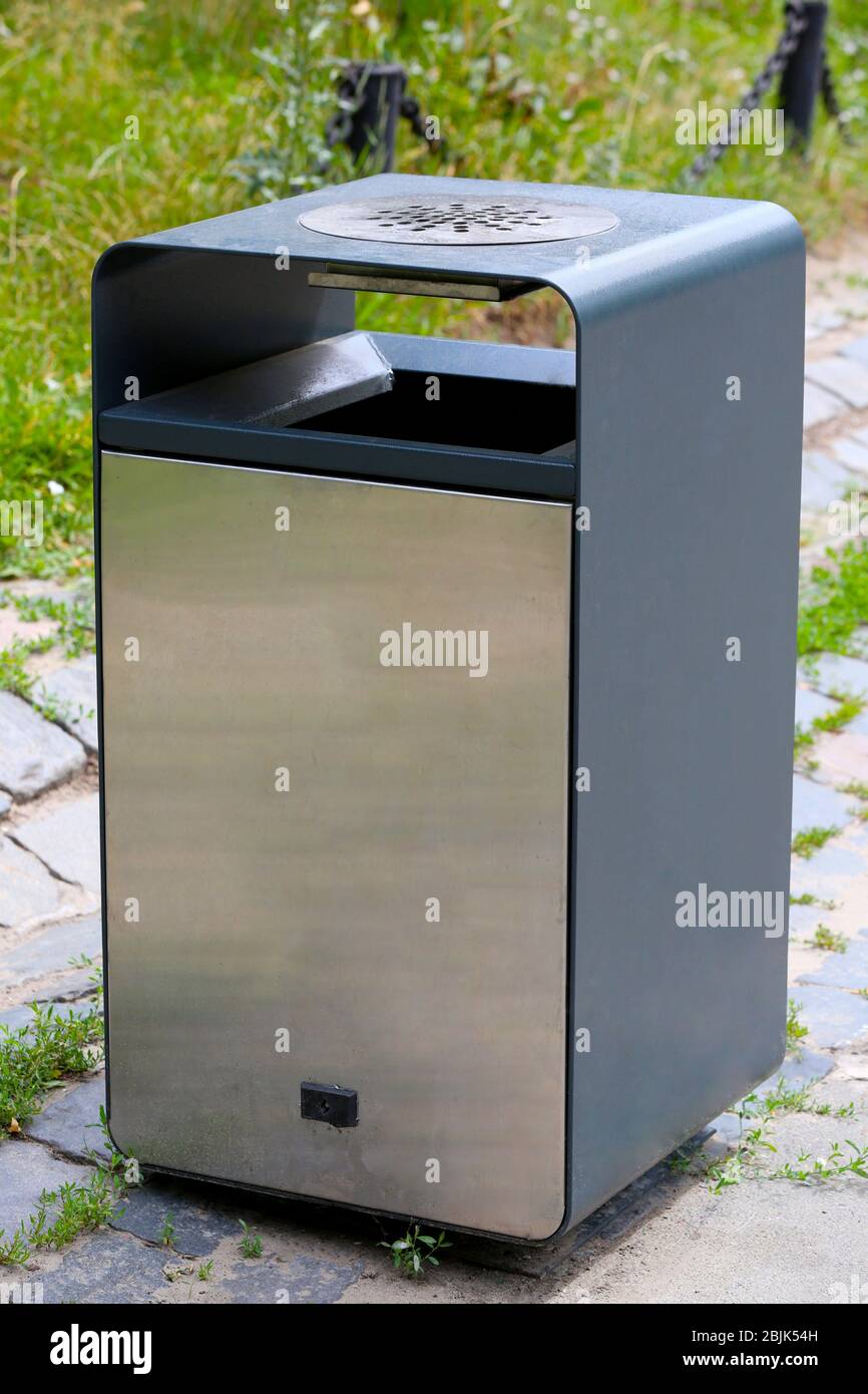 Modern garbage bin outdoors Stock Photo - Alamy
